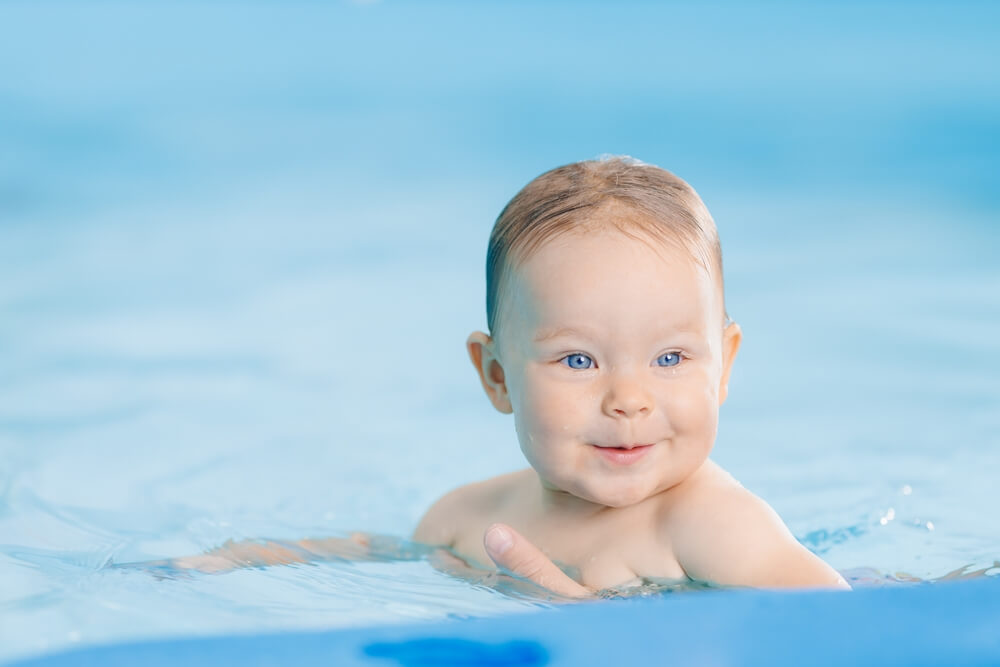 When Can Babies Go in a Pool? Age, Safety Tips, and Chlorine Pool ...