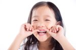 The Silver Tooth Kid Trend: What It Is and Why Kids Have Silver Crowns ...
